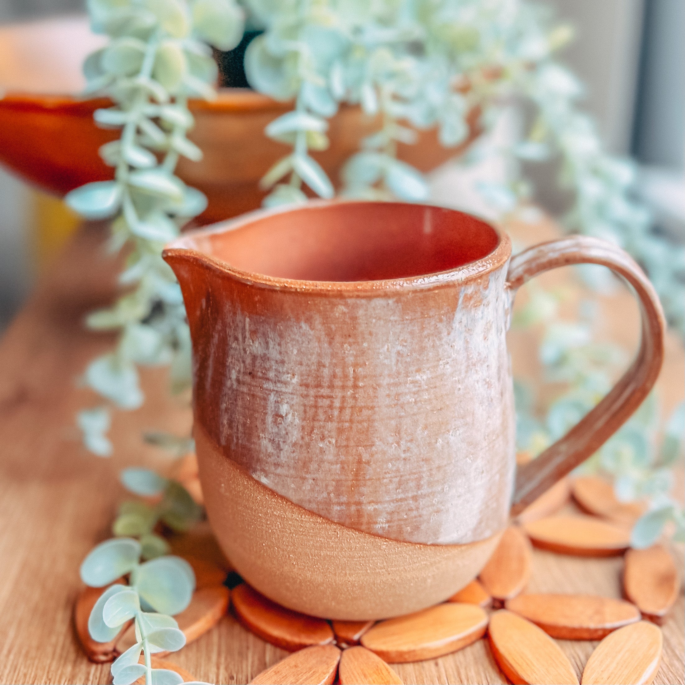 23oz Pitcher – The Feathered Hand